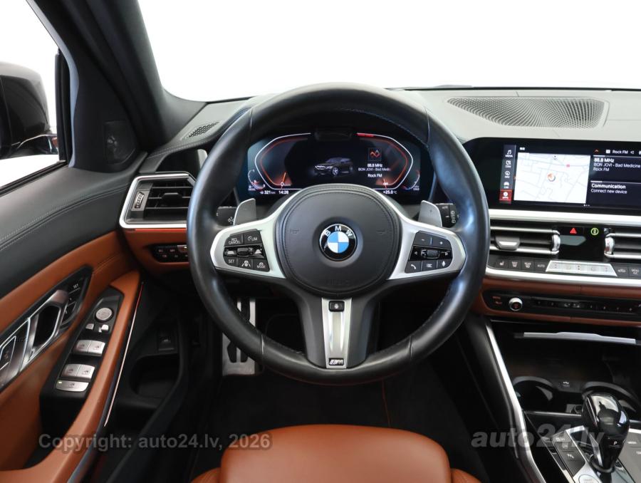 Black BMW 3 Series 2021 in Tallinn, with an engine capacity of 2.00 L and mileage of 155 thousand km for 28900 €, photo 23 on AUTOMOTO.COM.LV
