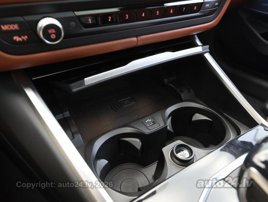 Black BMW 3 Series 2021 in Tallinn, with an engine capacity of 2.00 L and mileage of 155 thousand km for 28900 €, photo 26 on AUTOMOTO.COM.LV