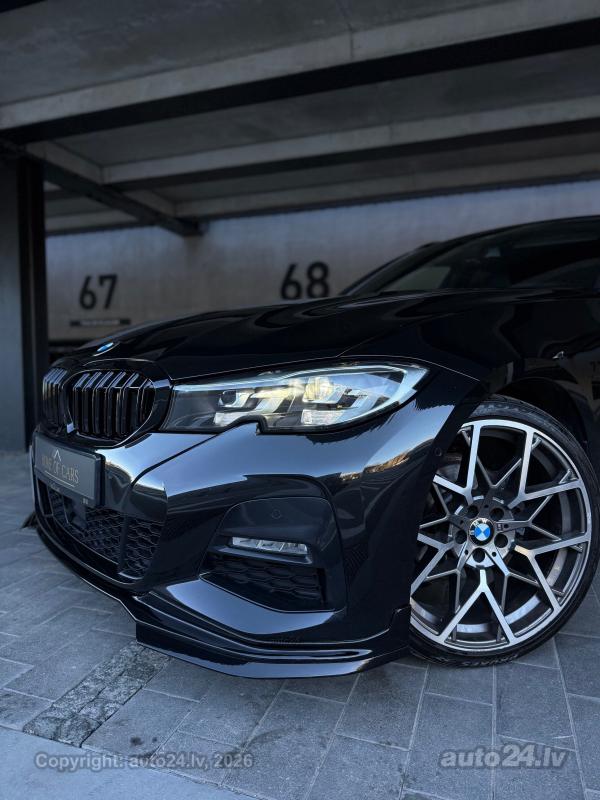 Melns BMW 3 Series 2021 Rīga, ar dzinēja tilpumu 2.00 L un nobraukumu 126 tūkst. km par 25000 €, foto 5 vietnē AUTOMOTO.COM.LV