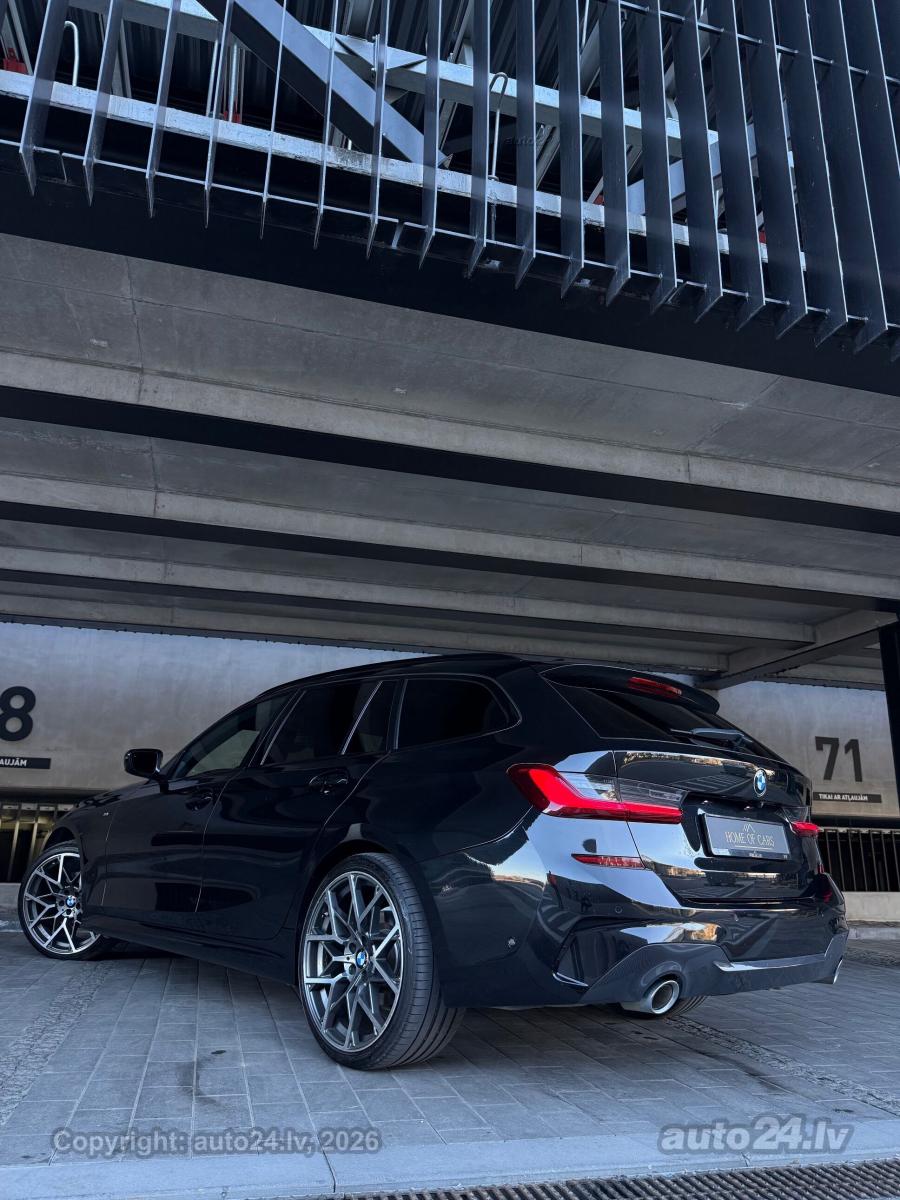 Black BMW 3 Series 2021 in Riga, with an engine capacity of 2.00 L and mileage of 126 thousand km for 25000 €, photo 9 on AUTOMOTO.COM.LV