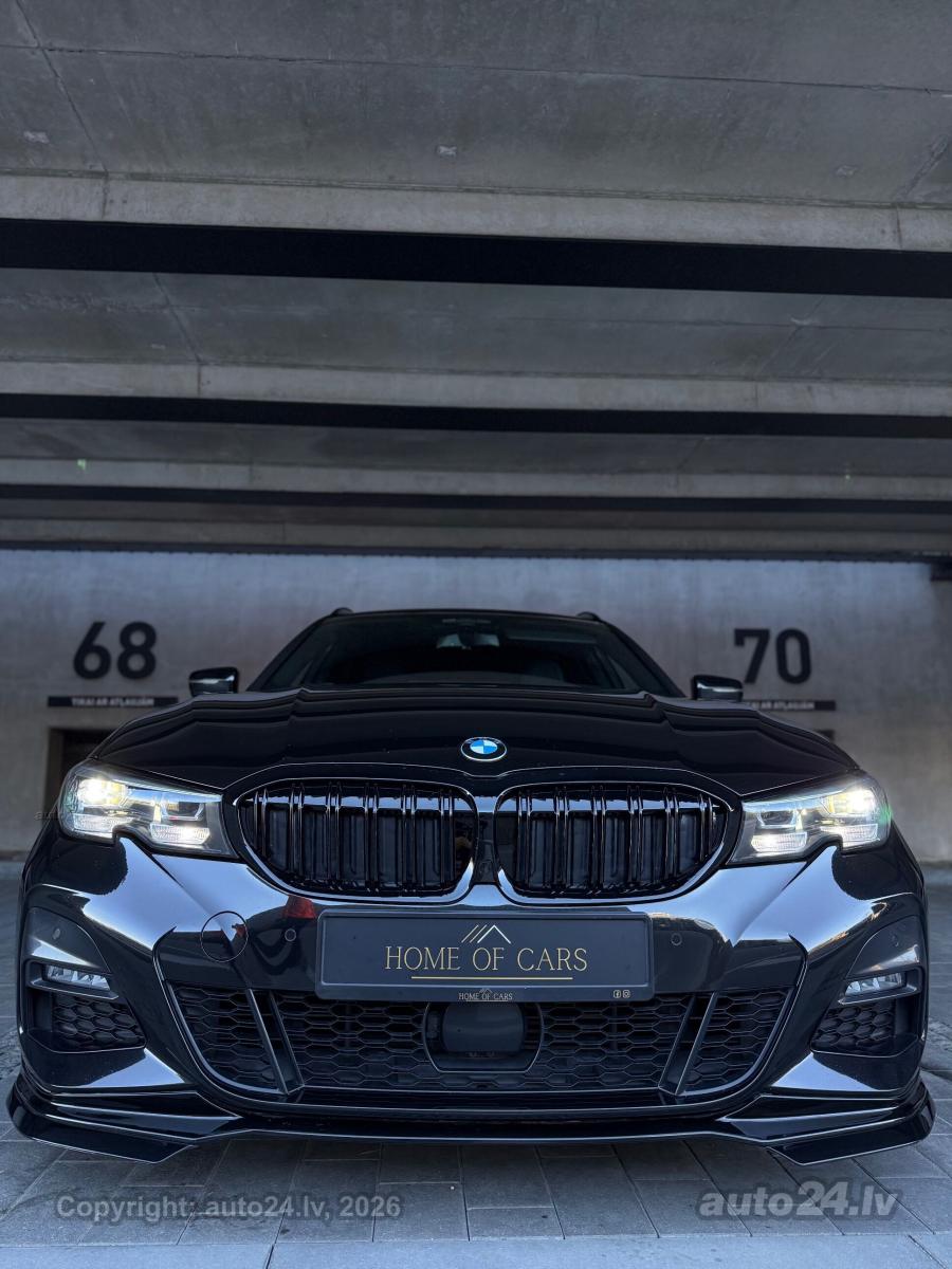 Black BMW 3 Series 2021 in Riga, with an engine capacity of 2.00 L and mileage of 126 thousand km for 25000 €, photo 10 on AUTOMOTO.COM.LV