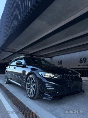 Black BMW 3 Series 2021 in Riga, with an engine capacity of 2.00 L and mileage of 126 thousand km for 25000 €, photo 15 on AUTOMOTO.COM.LV