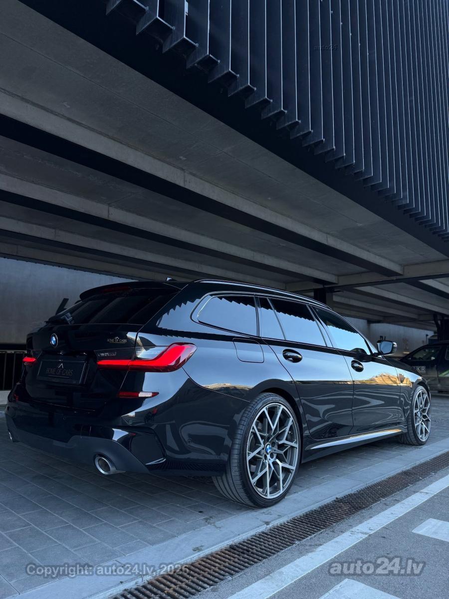 Black BMW 3 Series 2021 in Riga, with an engine capacity of 2.00 L and mileage of 126 thousand km for 25000 €, photo 16 on AUTOMOTO.COM.LV
