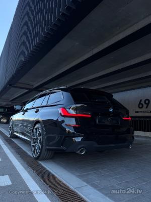 Black BMW 3 Series 2021 in Riga, with an engine capacity of 2.00 L and mileage of 126 thousand km for 25000 €, photo 17 on AUTOMOTO.COM.LV