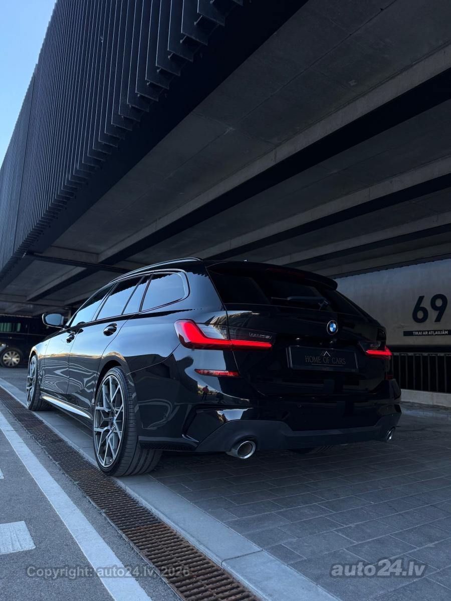 Black BMW 3 Series 2021 in Riga, with an engine capacity of 2.00 L and mileage of 126 thousand km for 25000 €, photo 17 on AUTOMOTO.COM.LV