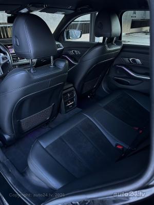 Black BMW 3 Series 2021 in Riga, with an engine capacity of 2.00 L and mileage of 126 thousand km for 25000 €, photo 18 on AUTOMOTO.COM.LV