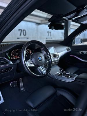Black BMW 3 Series 2021 in Riga, with an engine capacity of 2.00 L and mileage of 126 thousand km for 25000 €, photo 20 on AUTOMOTO.COM.LV