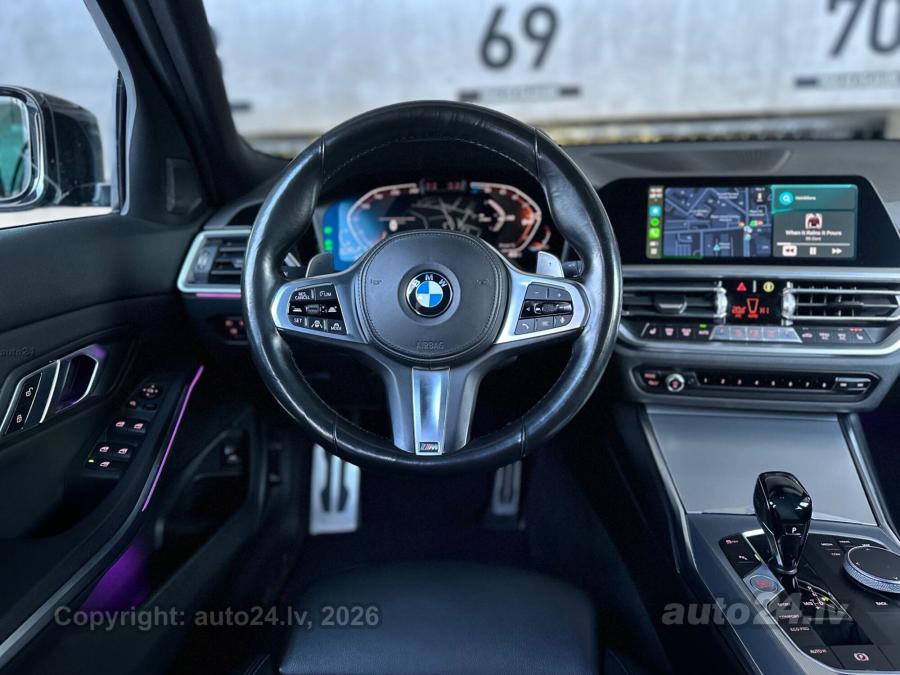Black BMW 3 Series 2021 in Riga, with an engine capacity of 2.00 L and mileage of 126 thousand km for 25000 €, photo 23 on AUTOMOTO.COM.LV
