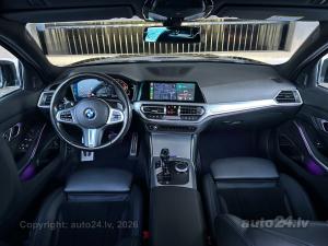 Black BMW 3 Series 2021 in Riga, with an engine capacity of 2.00 L and mileage of 126 thousand km for 25000 €, photo 26 on AUTOMOTO.COM.LV