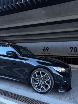 Black BMW 3 Series 2021 in Riga, with an engine capacity of 2.00 L and mileage of 126 thousand km for 25000 €, photo 30 on AUTOMOTO.COM.LV
