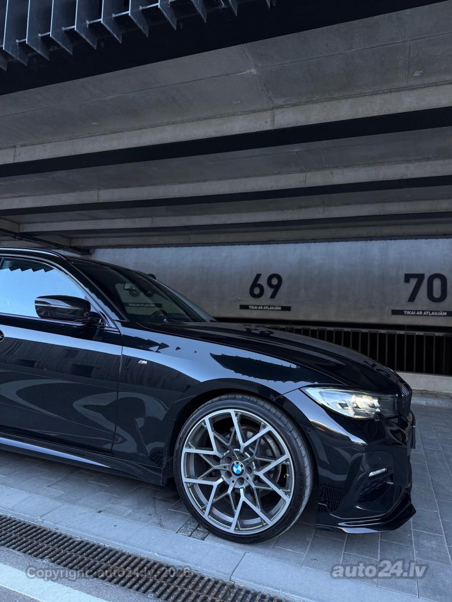 Black BMW 3 Series 2021 in Riga, with an engine capacity of 2.00 L and mileage of 126 thousand km for 25000 €, photo 30 on AUTOMOTO.COM.LV