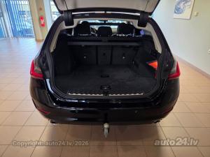 Melns BMW 3 Series 2022 Tartu, ar dzinēja tilpumu 2.00 L un nobraukumu 176 tūkst. km par 22490 €, foto 18 vietnē AUTOMOTO.COM.LV
