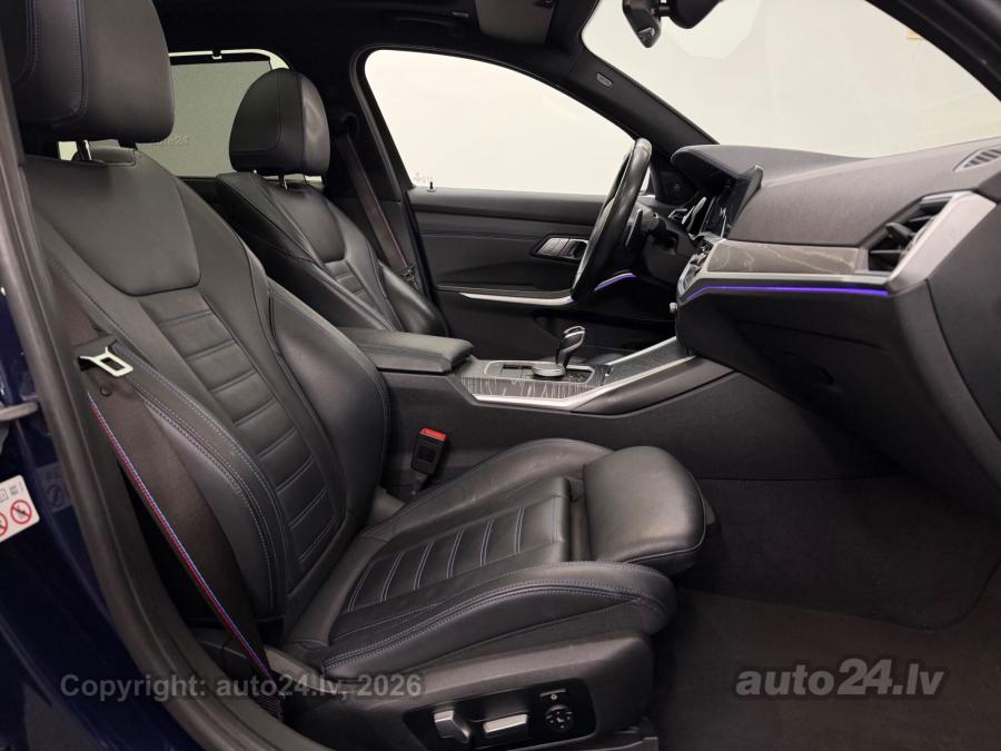 Blue BMW 3 Series 2019 in Parnu, with an engine capacity of 2.00 L and mileage of 186 thousand km for 25900 €, photo 6 on AUTOMOTO.COM.LV