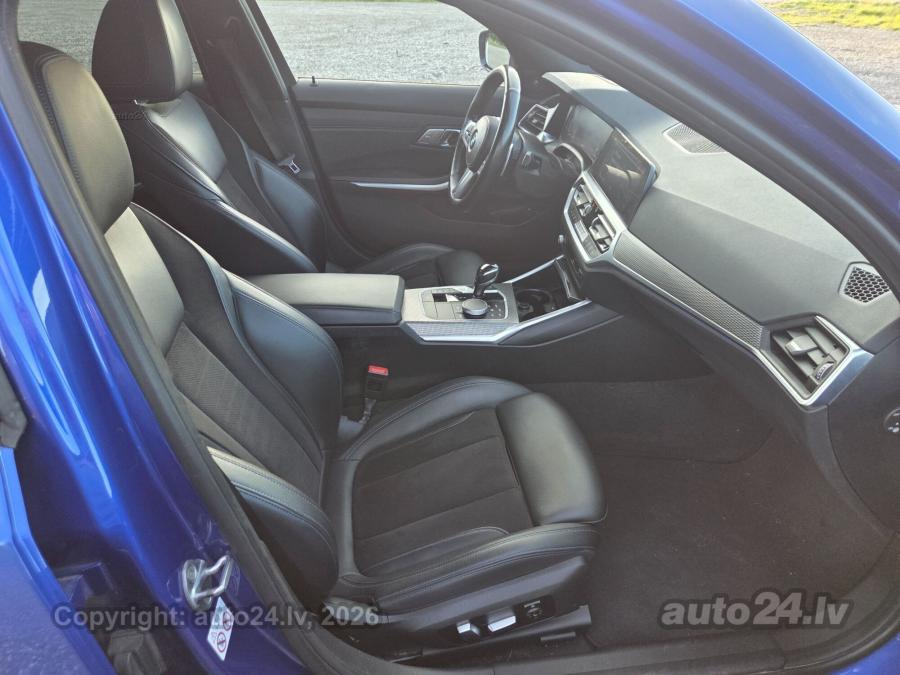 Blue BMW 3 Series 2020 in Tallinn, with an engine capacity of 2.00 L and mileage of 165 thousand km for 24990 €, photo 12 on AUTOMOTO.COM.LV