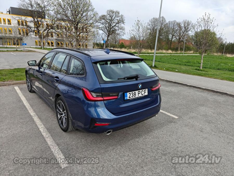 Blue BMW 3 Series 2021 in Tallinn, with an engine capacity of 2.00 L and mileage of 70 thousand km for 26500 €, photo 4 on AUTOMOTO.COM.LV