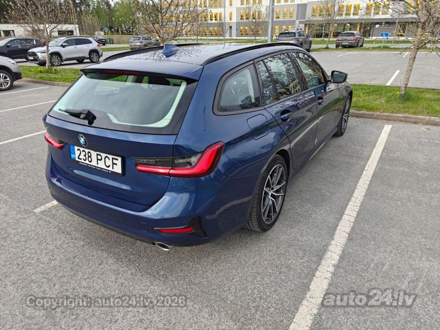 Blue BMW 3 Series 2021 in Tallinn, with an engine capacity of 2.00 L and mileage of 70 thousand km for 26500 €, photo 5 on AUTOMOTO.COM.LV