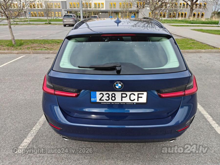 Blue BMW 3 Series 2021 in Tallinn, with an engine capacity of 2.00 L and mileage of 70 thousand km for 26500 €, photo 6 on AUTOMOTO.COM.LV