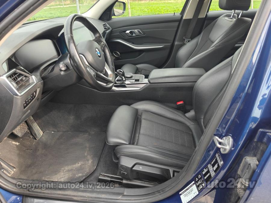 Blue BMW 3 Series 2021 in Tallinn, with an engine capacity of 2.00 L and mileage of 70 thousand km for 26500 €, photo 7 on AUTOMOTO.COM.LV