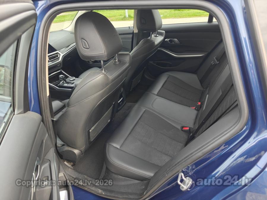 Blue BMW 3 Series 2021 in Tallinn, with an engine capacity of 2.00 L and mileage of 70 thousand km for 26500 €, photo 9 on AUTOMOTO.COM.LV