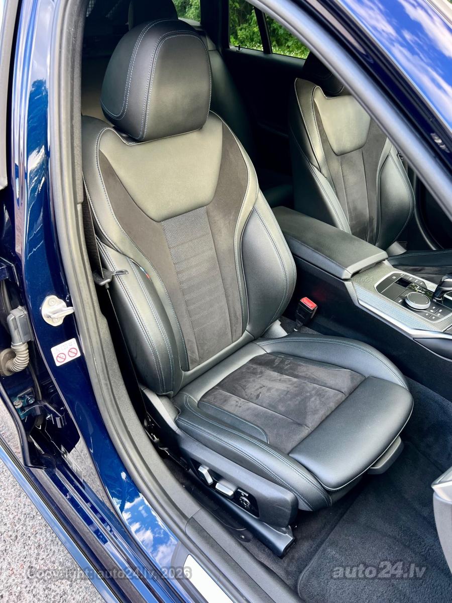 Blue BMW 3 Series 2021 in Tallinn, with an engine capacity of 3.00 L and mileage of 81 thousand km for 31900 €, photo 14 on AUTOMOTO.COM.LV