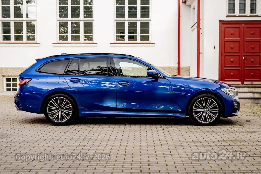 Zils BMW 3 Series 2021 Tallina, ar dzinēja tilpumu 2.00 L un nobraukumu 128 tūkst. km par 27600 €, foto 8 vietnē AUTOMOTO.COM.LV