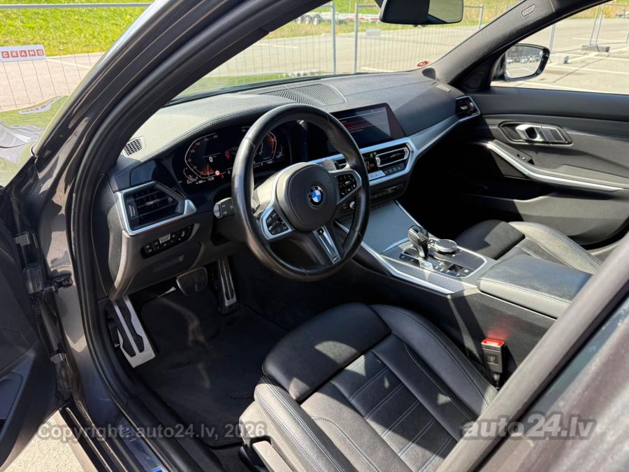 Grey BMW 3 Series 2021 in Tallinn, with an engine capacity of 2.00 L and mileage of 75 thousand km for 38000 €, photo 9 on AUTOMOTO.COM.LV