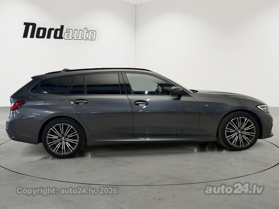 Grey BMW 3 Series 2021 in Tallinn, with an engine capacity of 2.00 L and mileage of 168 thousand km for 21900 €, photo 5 on AUTOMOTO.COM.LV