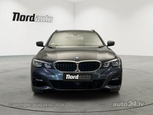 Grey BMW 3 Series 2021 in Tallinn, with an engine capacity of 2.00 L and mileage of 168 thousand km for 21900 €, photo 6 on AUTOMOTO.COM.LV
