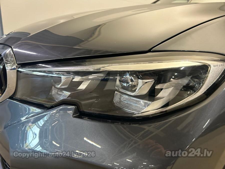 Grey BMW 3 Series 2021 in Tallinn, with an engine capacity of 2.00 L and mileage of 168 thousand km for 21900 €, photo 21 on AUTOMOTO.COM.LV