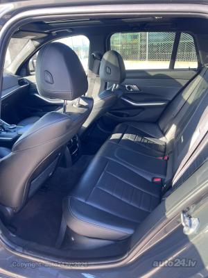 Grey BMW 3 Series 2021 in Tallinn, with an engine capacity of 2.00 L and mileage of 212 thousand km for 24000 €, photo 12 on AUTOMOTO.COM.LV