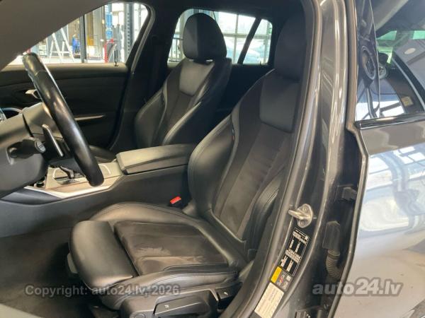 Grey BMW 3 Series 2022 in Tartu, with an engine capacity of 2.00 L and mileage of 225 thousand km for 22900 €, photo 11 on AUTOMOTO.COM.LV