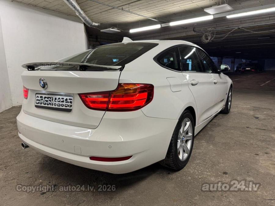 White BMW 3 Series 2014 in Riga, with an engine capacity of 2.00 L and mileage of 243 thousand km for 10900 €, photo 4 on AUTOMOTO.COM.LV
