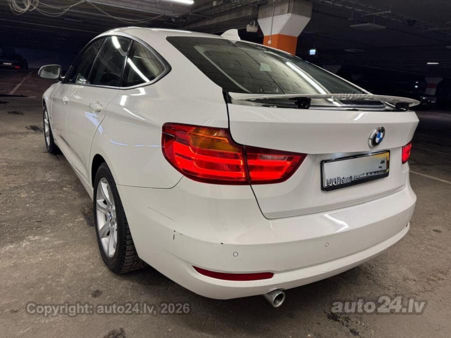 White BMW 3 Series 2014 in Riga, with an engine capacity of 2.00 L and mileage of 243 thousand km for 10900 €, photo 5 on AUTOMOTO.COM.LV