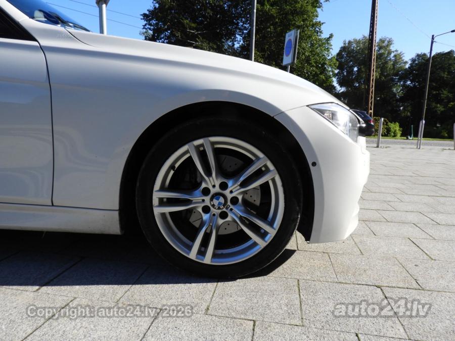 White BMW 3 Series 2012 in Tallinn, with an engine capacity of 3.00 L and mileage of 185 thousand km for 16990 €, photo 13 on AUTOMOTO.COM.LV
