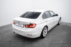 White BMW 3 Series 2013 in Tallinn, with an engine capacity of 2.00 L and mileage of 169 thousand km for 12999 €, photo 6 on AUTOMOTO.COM.LV
