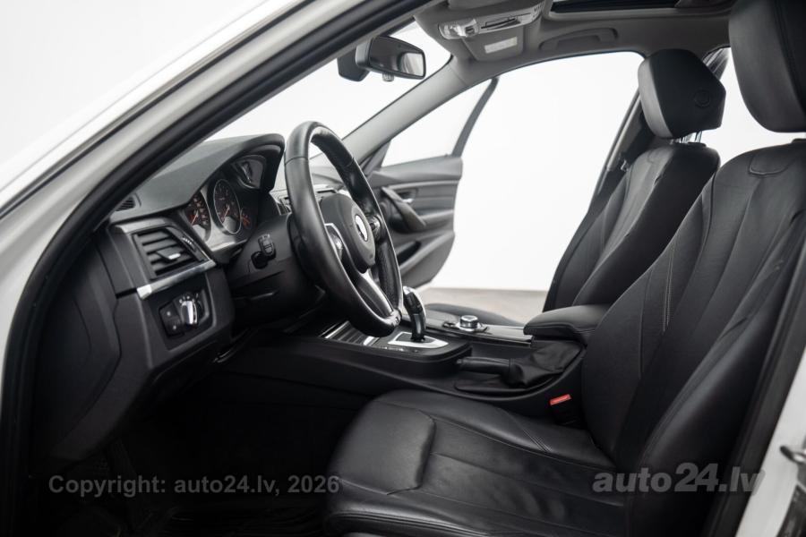 White BMW 3 Series 2013 in Tallinn, with an engine capacity of 2.00 L and mileage of 169 thousand km for 12999 €, photo 9 on AUTOMOTO.COM.LV