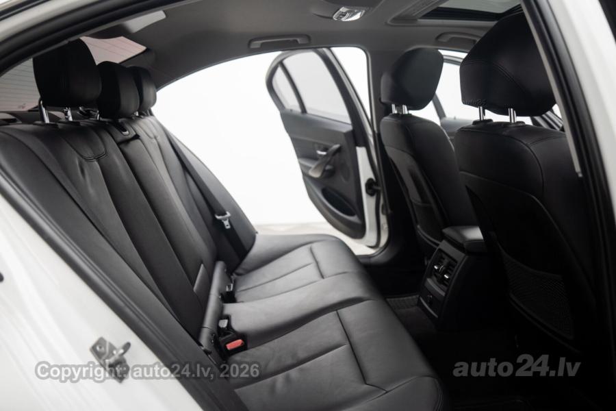 White BMW 3 Series 2013 in Tallinn, with an engine capacity of 2.00 L and mileage of 169 thousand km for 12999 €, photo 11 on AUTOMOTO.COM.LV