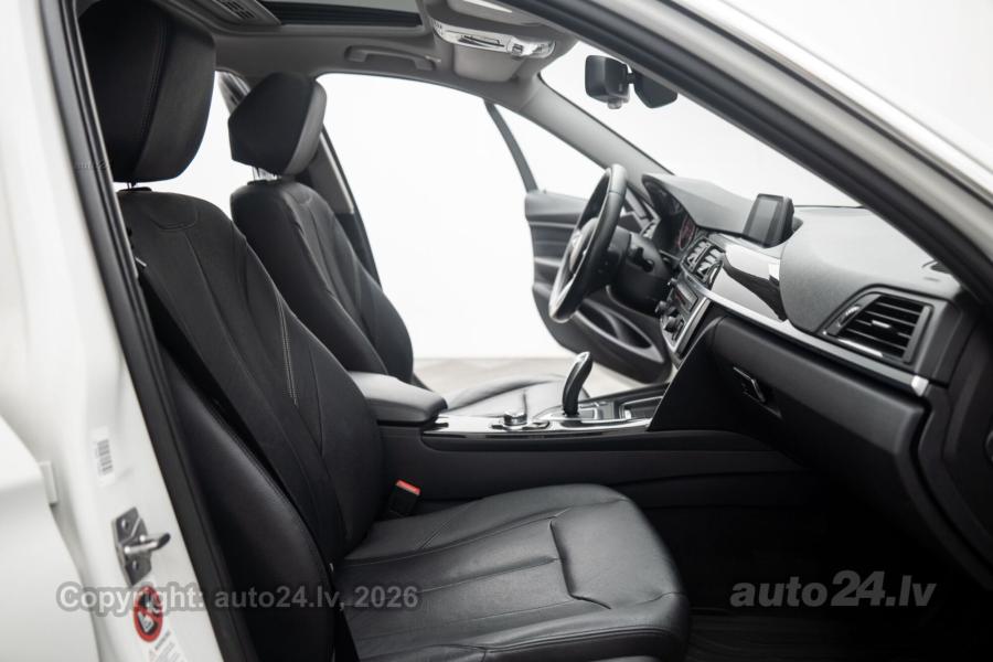 White BMW 3 Series 2013 in Tallinn, with an engine capacity of 2.00 L and mileage of 169 thousand km for 12999 €, photo 12 on AUTOMOTO.COM.LV