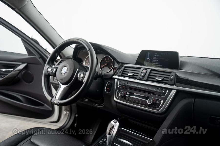 White BMW 3 Series 2013 in Tallinn, with an engine capacity of 2.00 L and mileage of 169 thousand km for 12999 €, photo 13 on AUTOMOTO.COM.LV