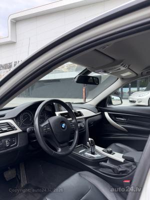 White BMW 3 Series 2013 in Tallinn, with an engine capacity of 1.60 L and mileage of 198 thousand km for 11700 €, photo 9 on AUTOMOTO.COM.LV