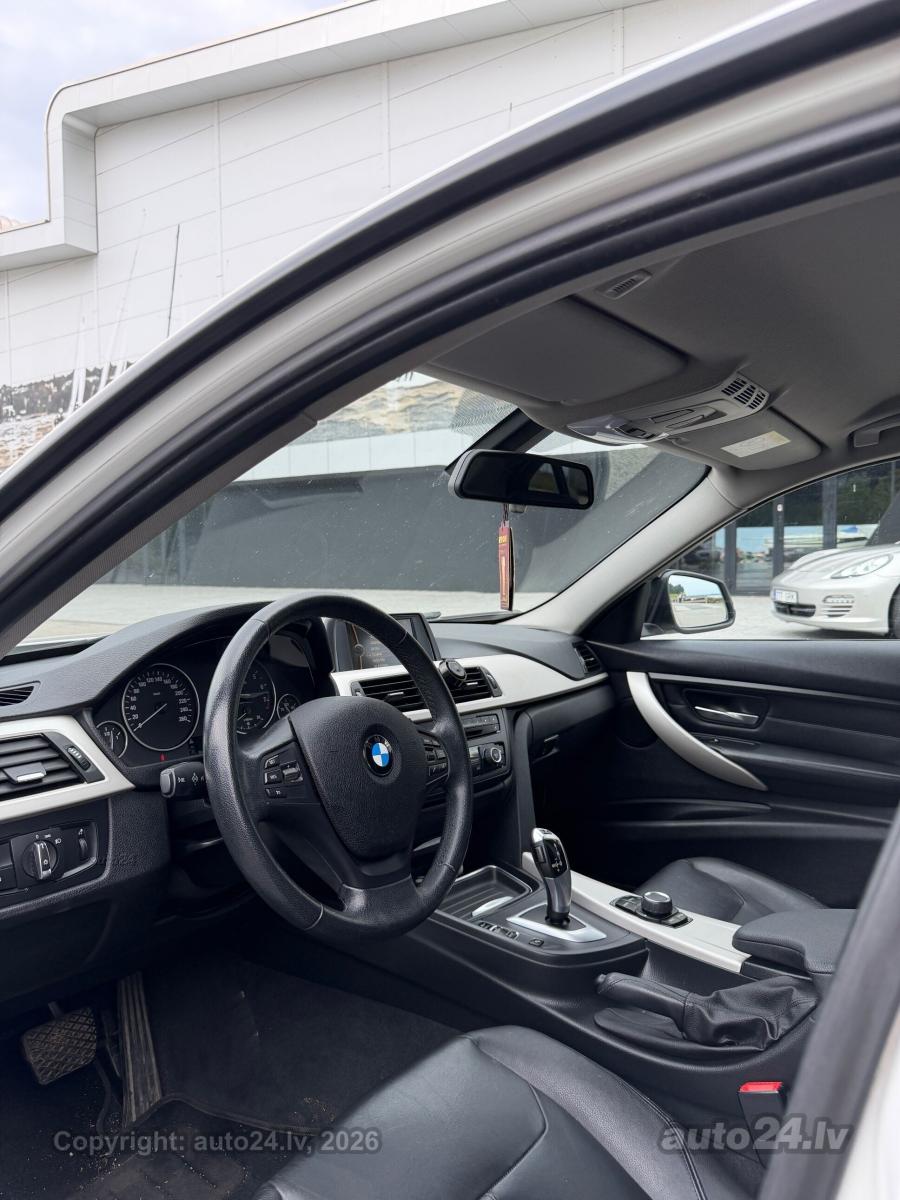 White BMW 3 Series 2013 in Tallinn, with an engine capacity of 1.60 L and mileage of 198 thousand km for 11700 €, photo 9 on AUTOMOTO.COM.LV