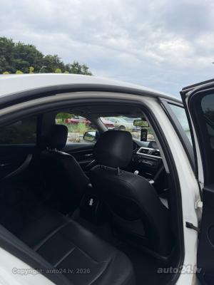 White BMW 3 Series 2013 in Tallinn, with an engine capacity of 1.60 L and mileage of 198 thousand km for 11700 €, photo 10 on AUTOMOTO.COM.LV