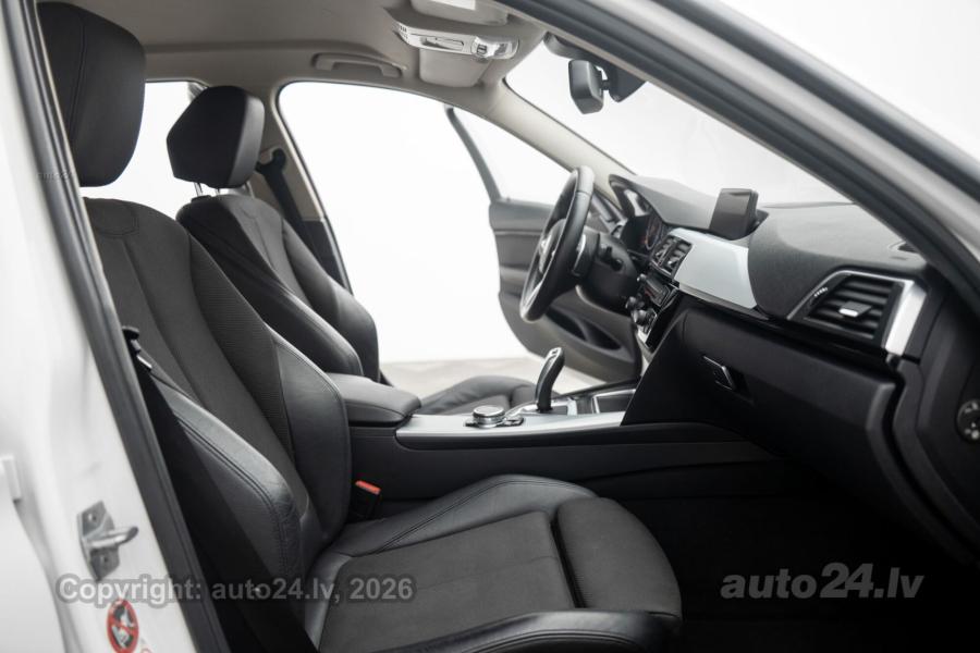 White BMW 3 Series 2016 in Tallinn, with an engine capacity of 2.00 L and mileage of 185 thousand km for 13999 €, photo 12 on AUTOMOTO.COM.LV
