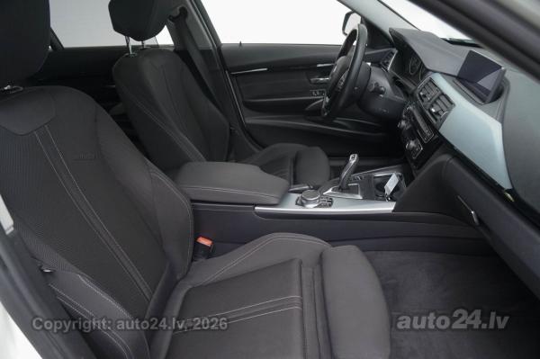 White BMW 3 Series 2018 in Tallinn, with an engine capacity of 2.00 L and mileage of 227 thousand km for 13990 €, photo 10 on AUTOMOTO.COM.LV