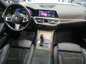 White BMW 3 Series 2021 in Tallinn, with an engine capacity of 2.00 L and mileage of 89 thousand km for 28900 €, photo 4 on AUTOMOTO.COM.LV