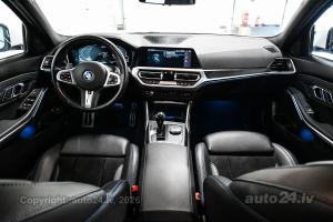 White BMW 3 Series 2021 in Tallinn, with an engine capacity of 2.00 L and mileage of 180 thousand km for 21450 €, photo 14 on AUTOMOTO.COM.LV