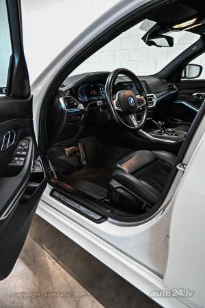 White BMW 3 Series 2021 in Tallinn, with an engine capacity of 2.00 L and mileage of 180 thousand km for 21450 €, photo 15 on AUTOMOTO.COM.LV