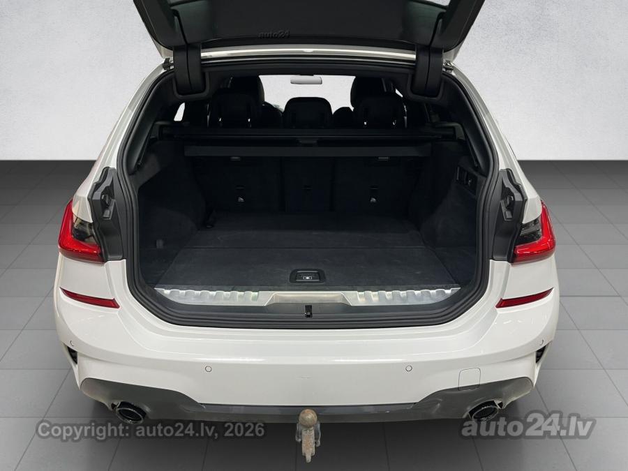 White BMW 3 Series 2021 in Tallinn, with an engine capacity of 2.00 L and mileage of 89 thousand km for 26900 €, photo 15 on AUTOMOTO.COM.LV