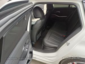 White BMW 3 Series 2022 in Tallinn, with an engine capacity of 2.00 L and mileage of 74 thousand km for 41900 €, photo 16 on AUTOMOTO.COM.LV