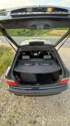 Black BMW 316 1998 in Bauska, with an engine capacity of 1.80 L and mileage of 240 thousand km for 2400 €, photo 5 on AUTOMOTO.COM.LV